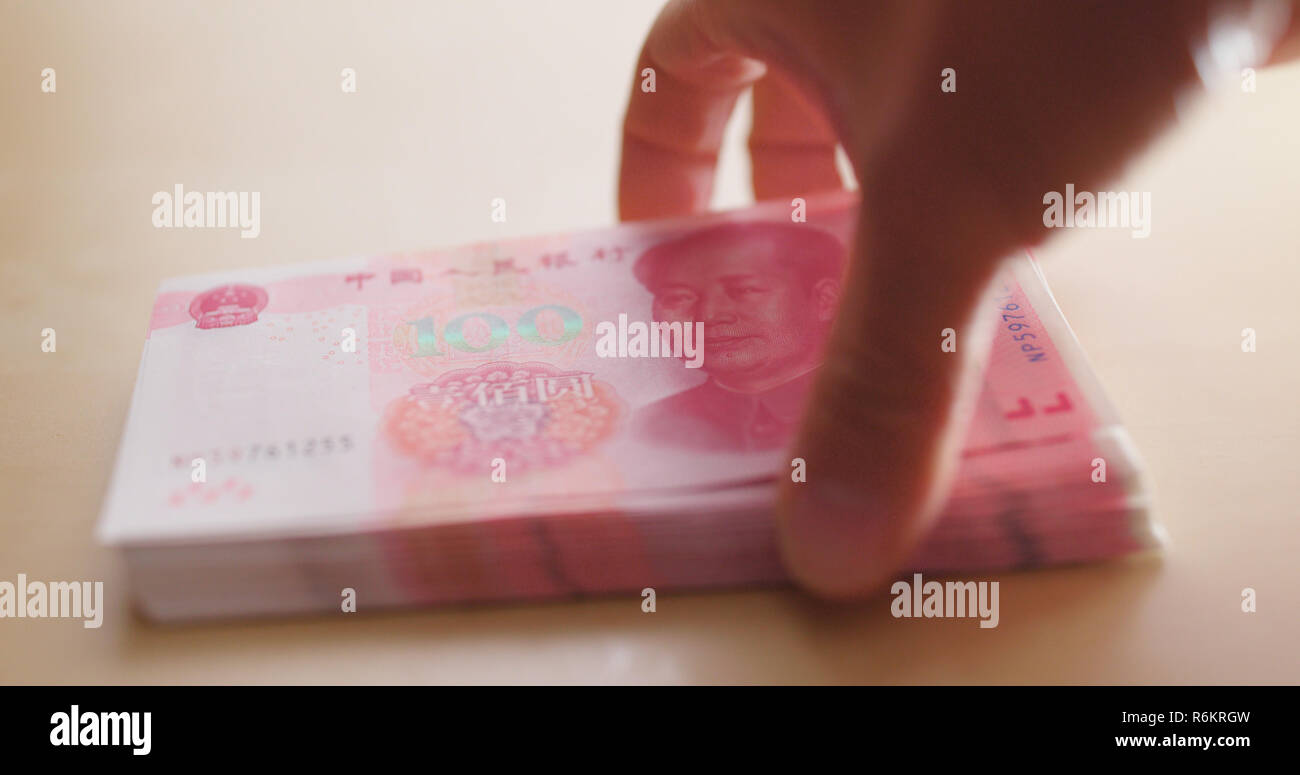 Taking stack rmb hi-res stock photography and images - Alamy
