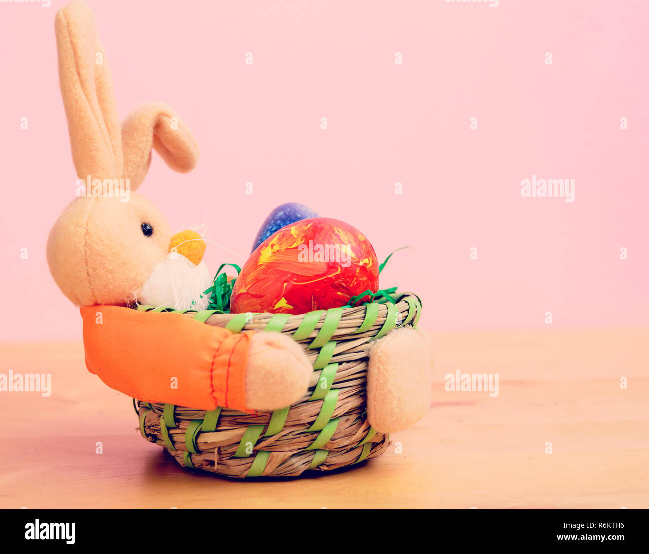 easter bunny in basket with egg Stock Photo - Alamy