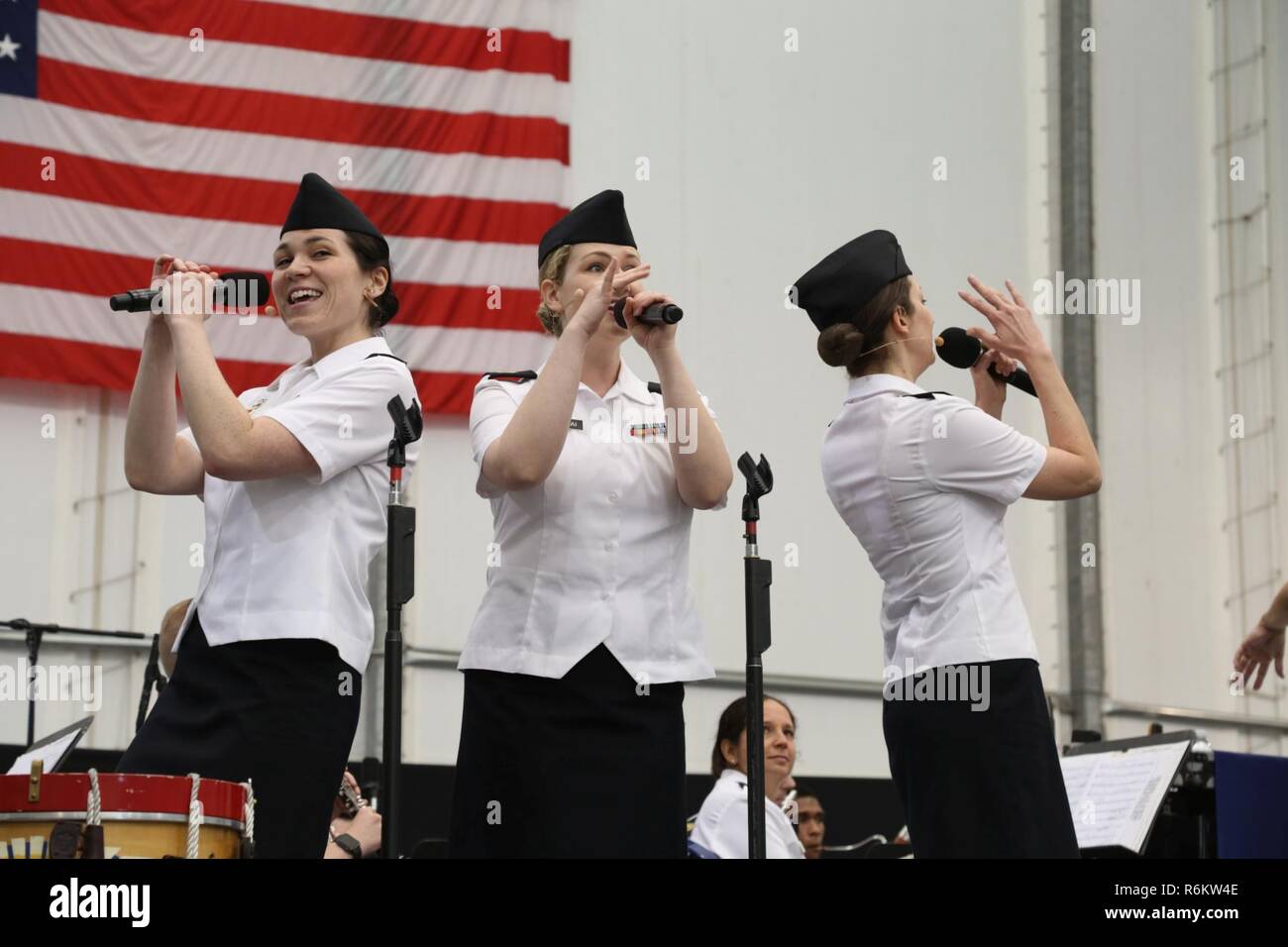 Members of the Soldier's Chorus sing "Boogie Woogie Bugle Boy" during ...