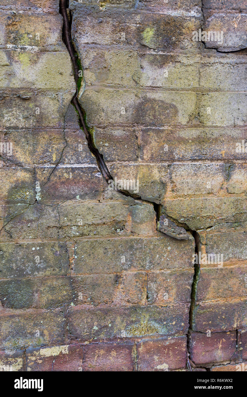 A large crack streaking through a brick wall of ruins. West Point ...