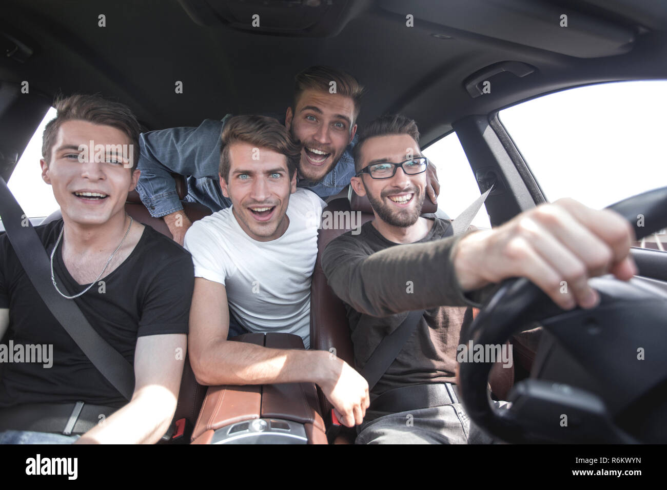 close up.funny friends travel in the car Stock Photo - Alamy