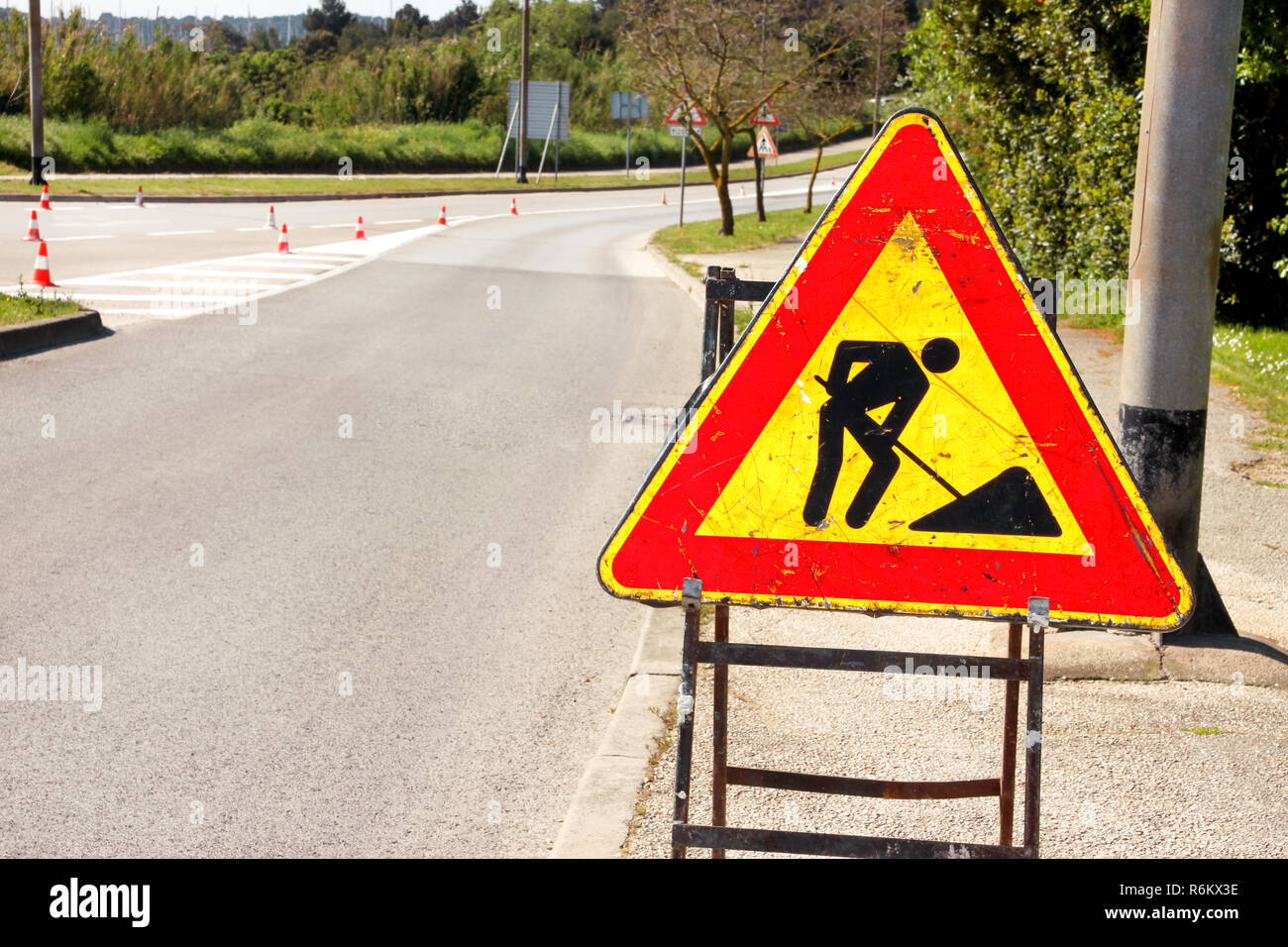 Road works sign for construction works in city street. Road under ...