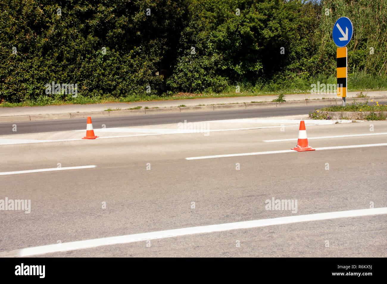 Work on road. Construction cones with traffic sign keep right sign ...