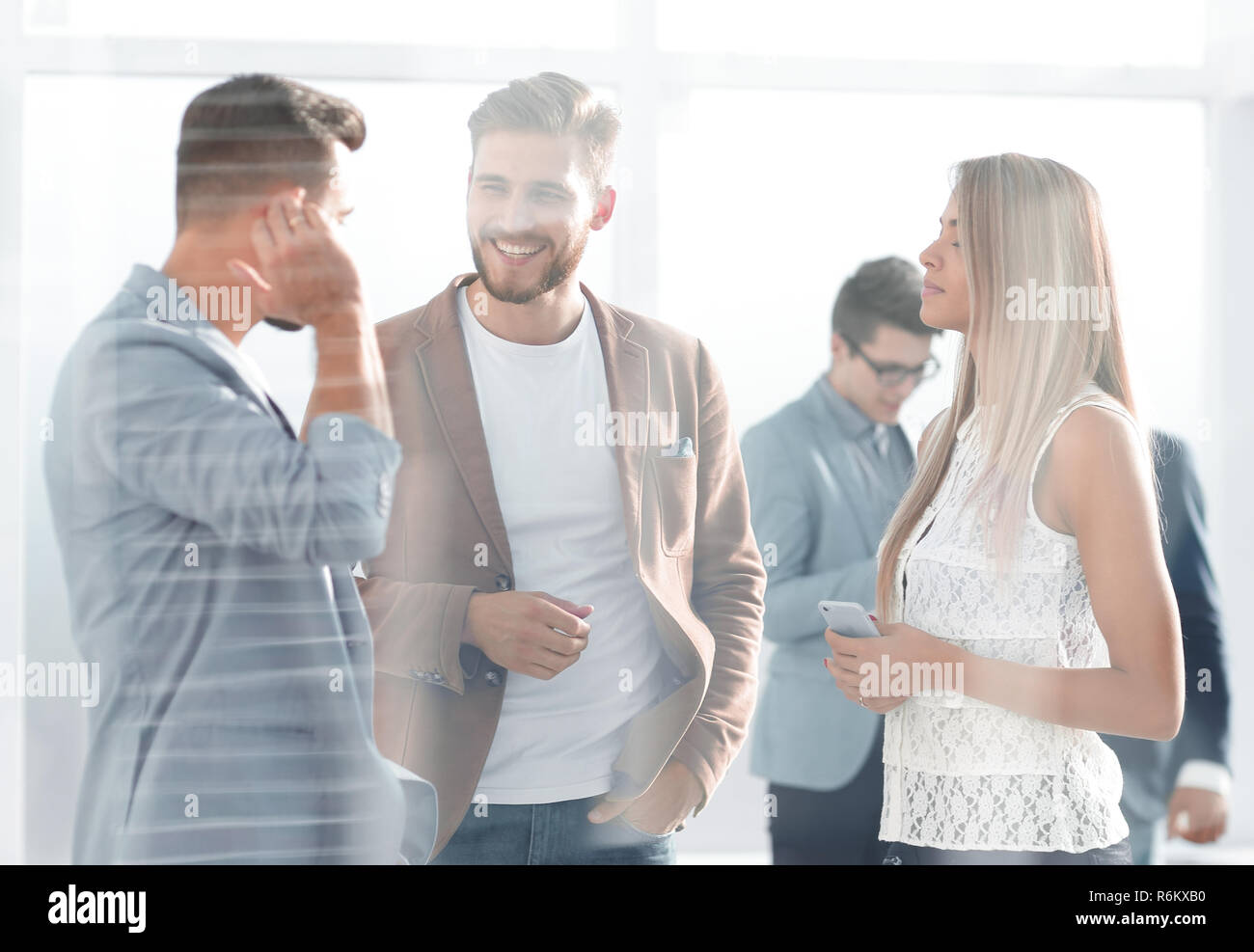 Businessman standing behind glass hi-res stock photography and images ...