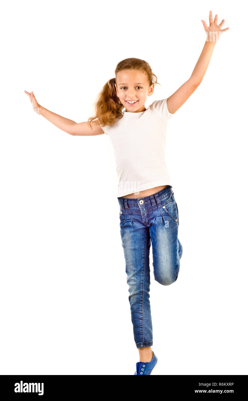 jumping little girl isolated on a white background Stock Photo - Alamy
