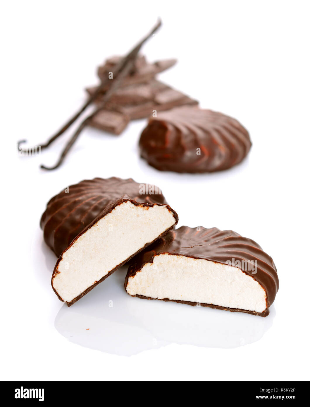 A chocolate-coated zefir with pieces of chocolate and vanilla pods ...