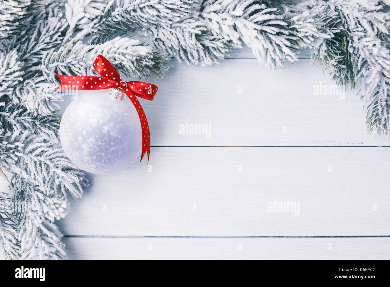 New Year concept. Flat lay with Xmas tree branches and Christmas ball ...