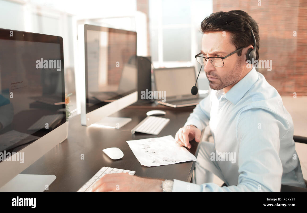 Man sitting in data centre hi-res stock photography and images - Alamy