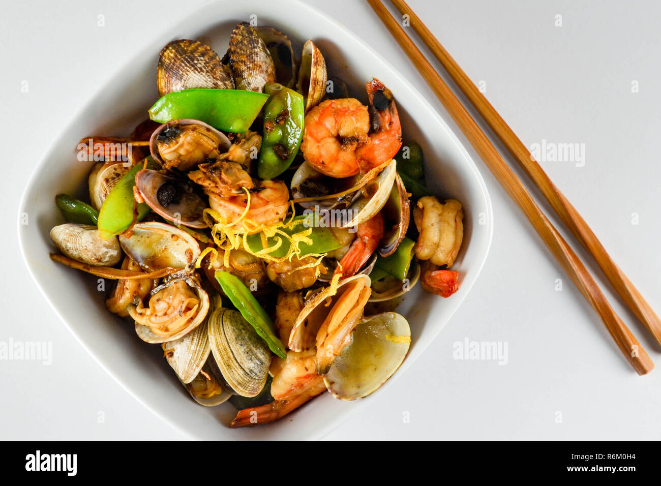 Stir-fried clams and shrimp in a Chinese black bean and citrus sauce ...