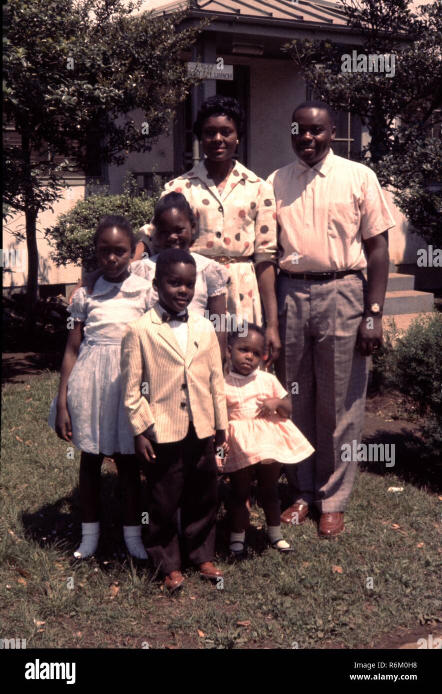 African-american family, including a mother, father and four children ...