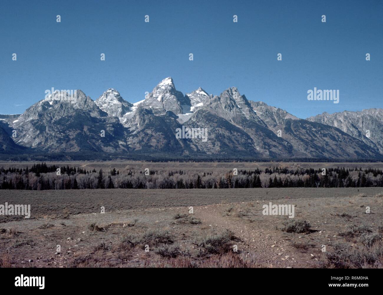 Long distance view of the grand teton mountain range hi-res stock ...