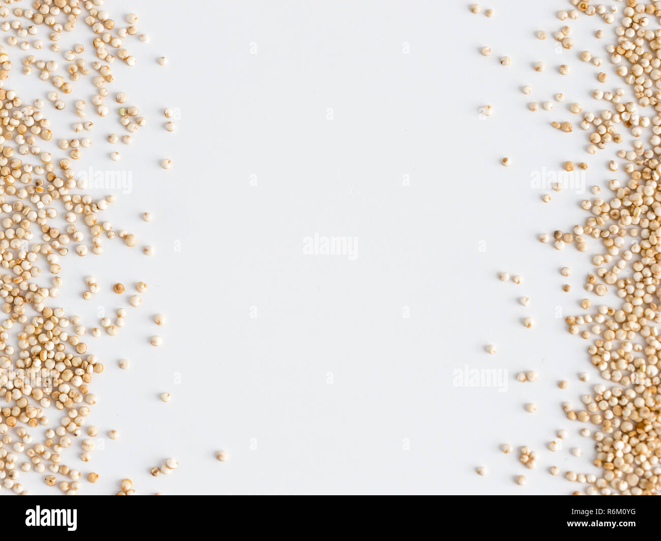 quinoa top view on white, isolated Stock Photo - Alamy