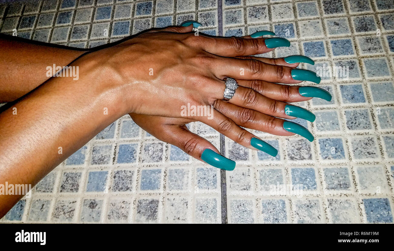 Woman shows off her beautiful nails Stock Photo - Alamy