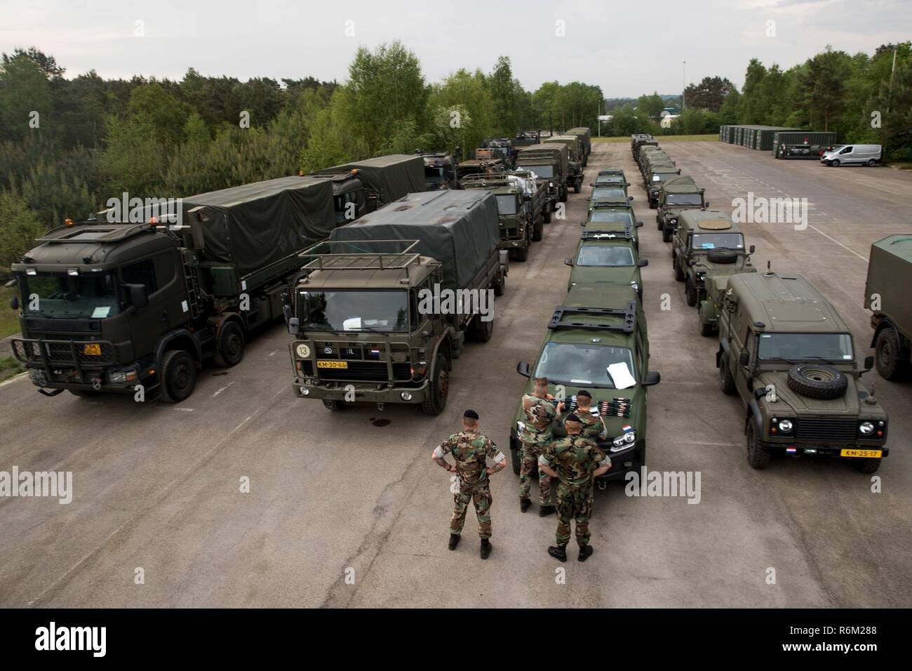 Dutch Marines in cooperation of MOVECON units load their equipment on ...