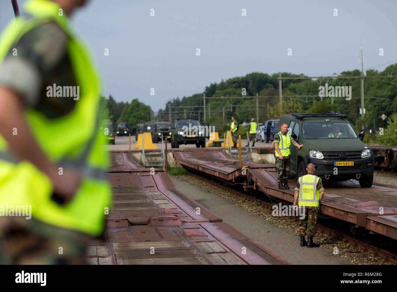 Dutch Marines in cooperation of MOVECON units load their equipment on ...