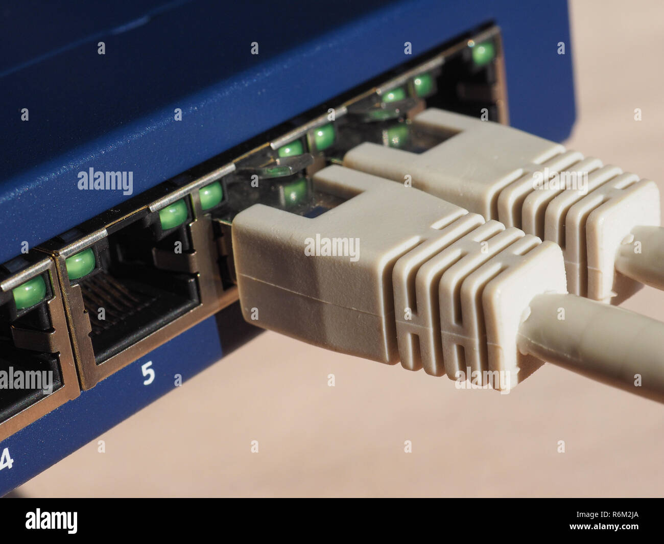 Modem router switch with RJ45 ethernet plug ports Stock Photo - Alamy