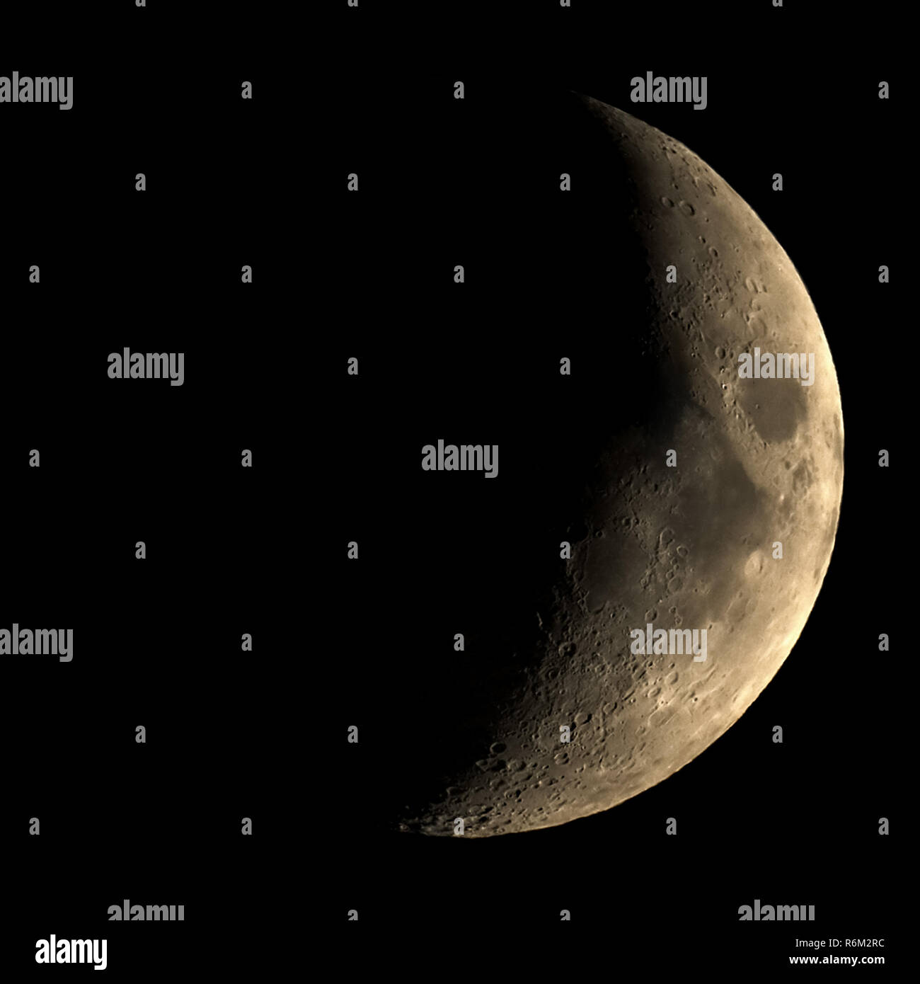 High contrast Waxing crescent moon seen with telescope Stock Photo - Alamy