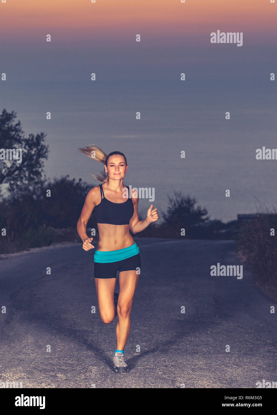 Beautiful running girl Stock Photo - Alamy