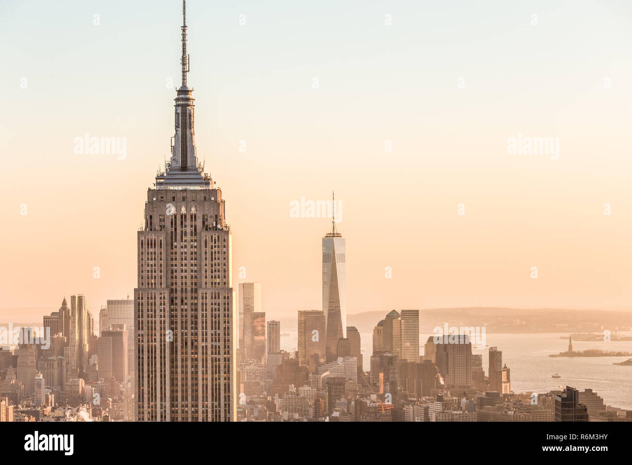 New York City skyline with urban skyscrapers at sunset, USA Stock Photo ...
