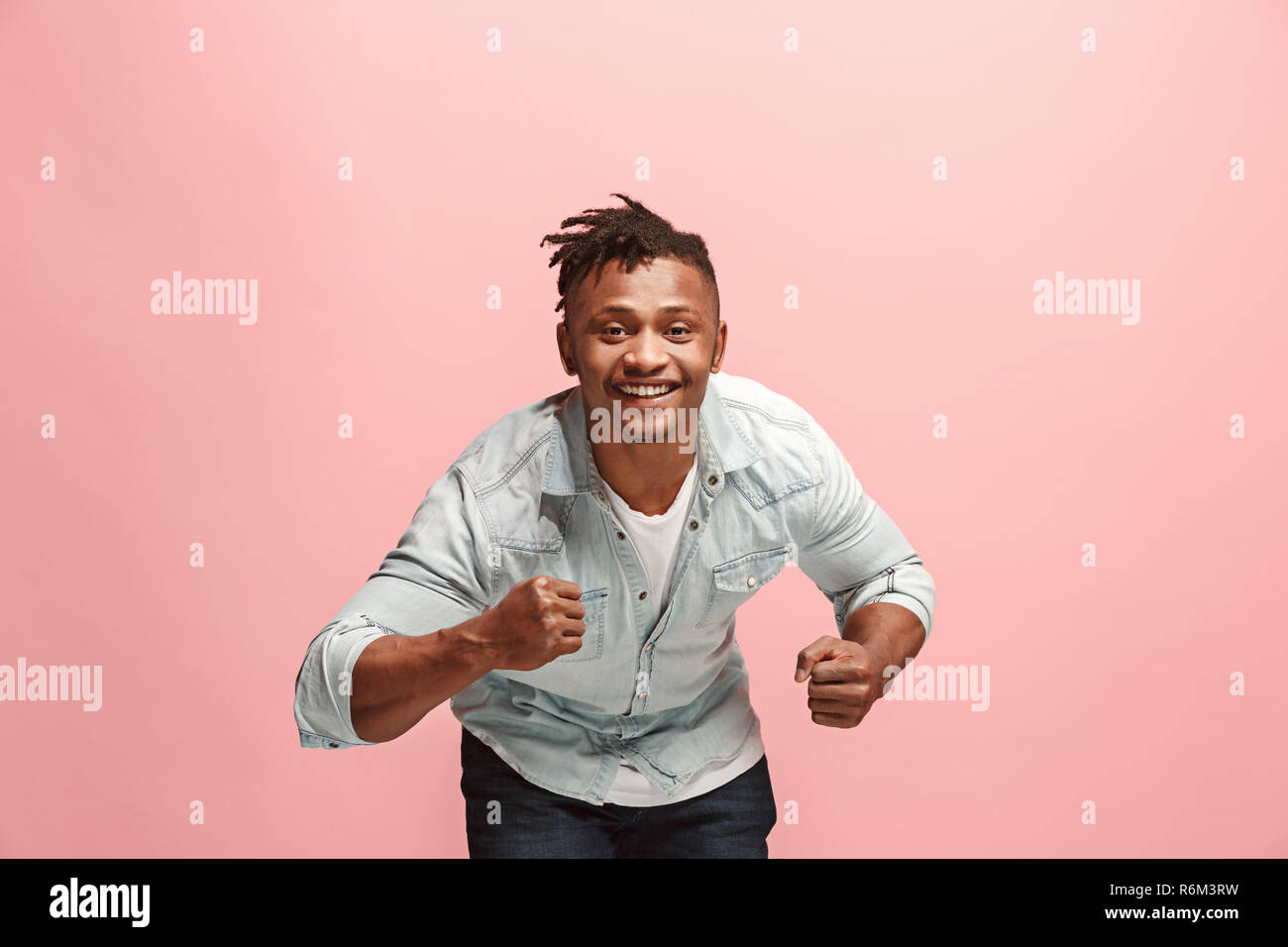 Winning success man happy ecstatic celebrating being a winner. Dynamic ...