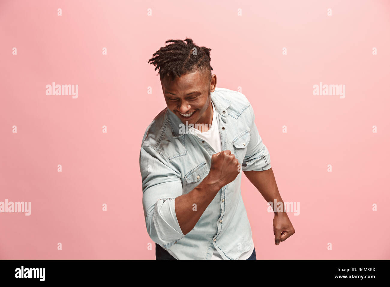 Winning success man happy ecstatic celebrating being a winner. Dynamic ...