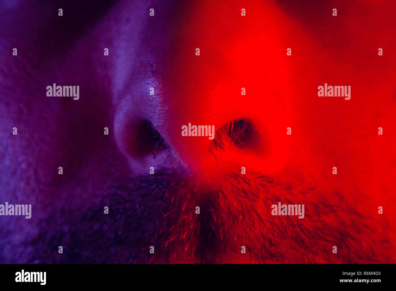 Macro on man nose with expressionless Stock Photo - Alamy