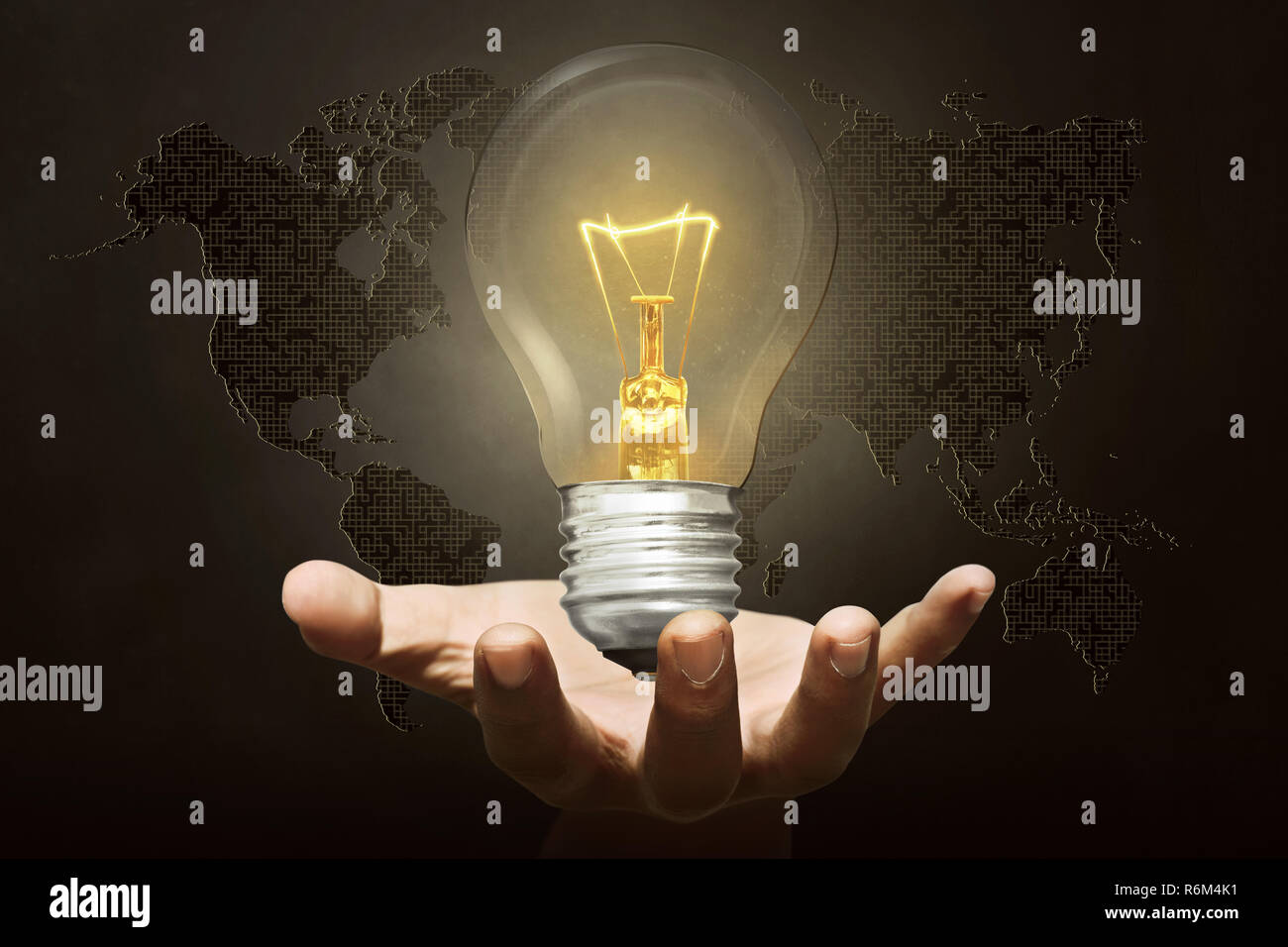 Human hand holding glowing lights bulb Stock Photo - Alamy