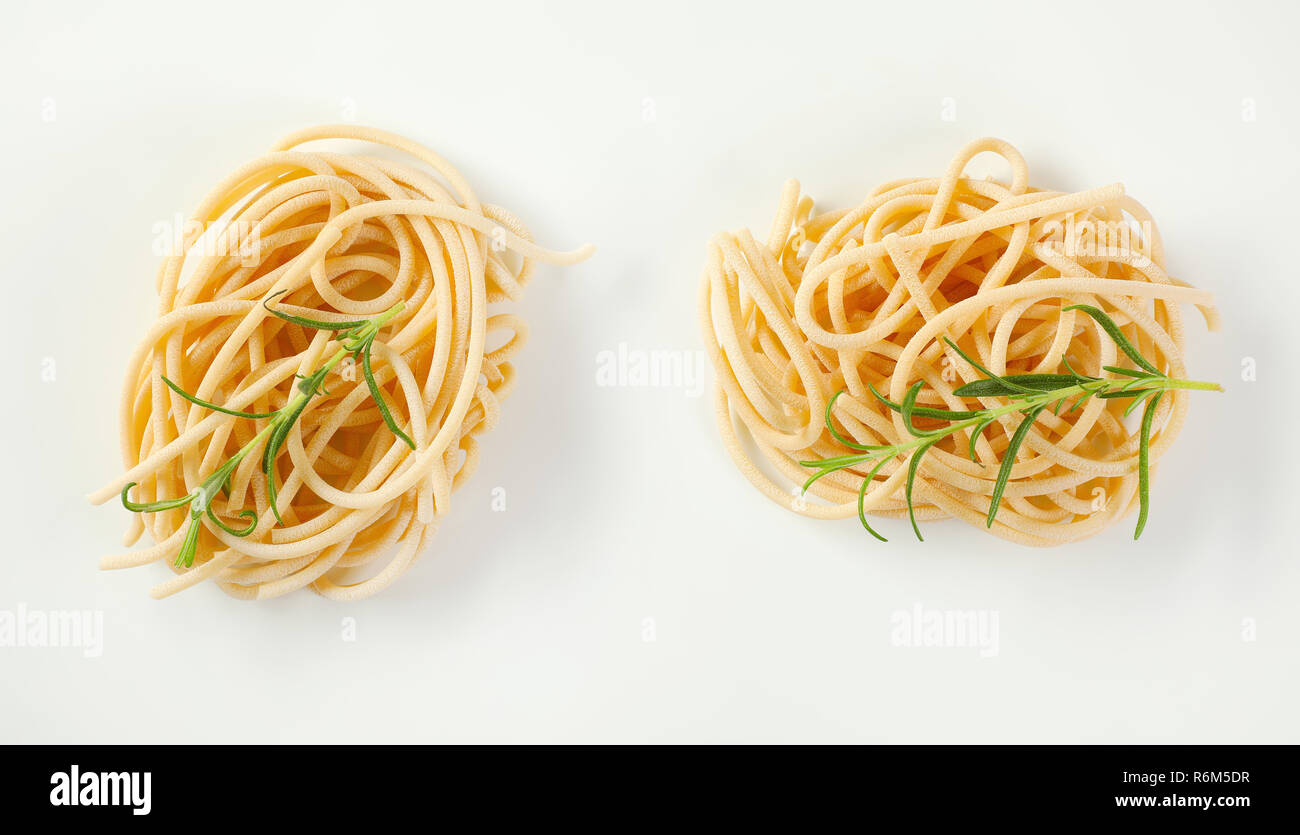 bundles of spaghetti pasta Stock Photo - Alamy