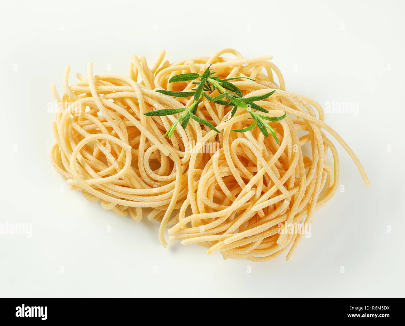 bundles of spaghetti pasta Stock Photo - Alamy