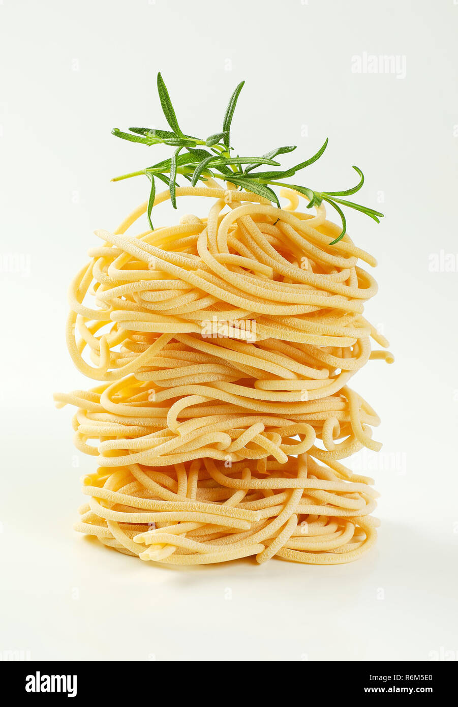 bundles of spaghetti pasta Stock Photo - Alamy