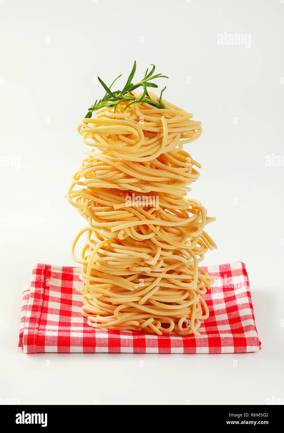 bundles of spaghetti pasta Stock Photo - Alamy