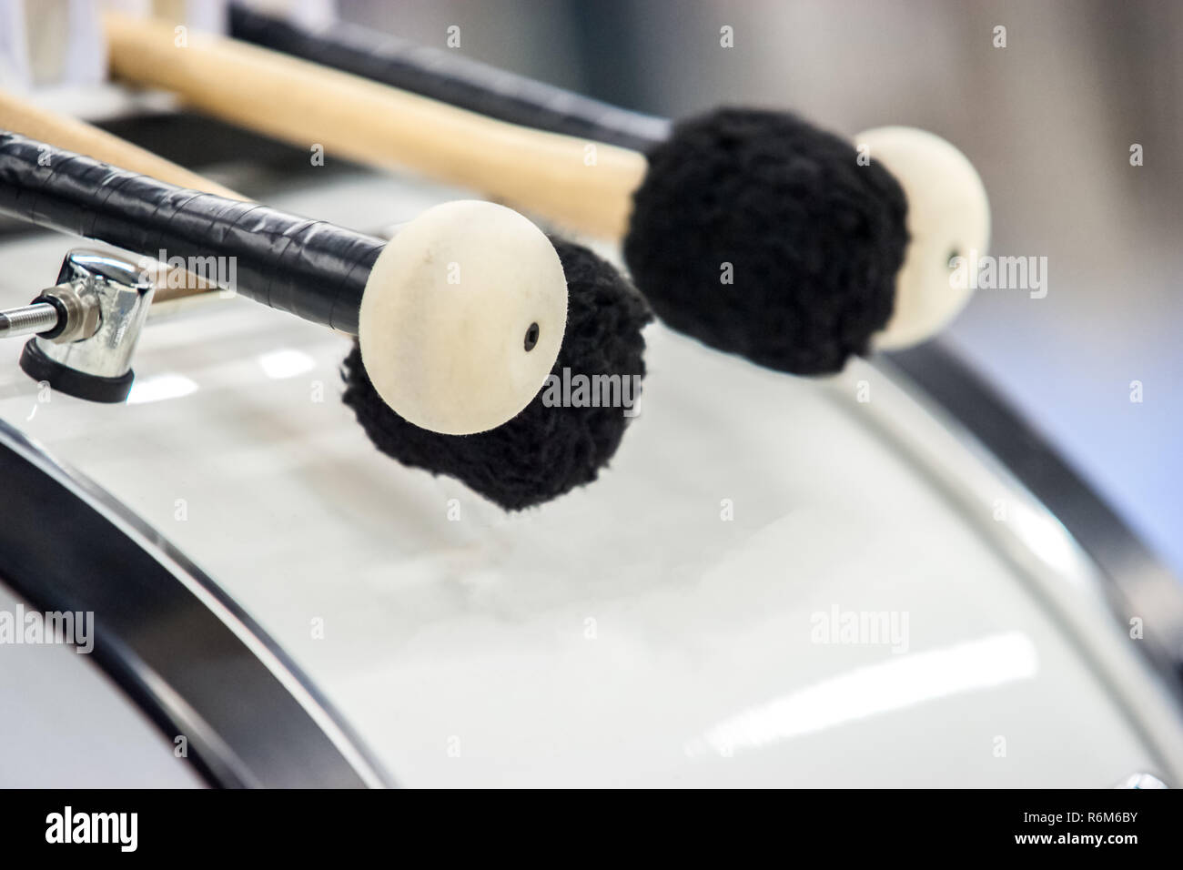 Several drumsticks mounted on a bass drum for different percussion ...