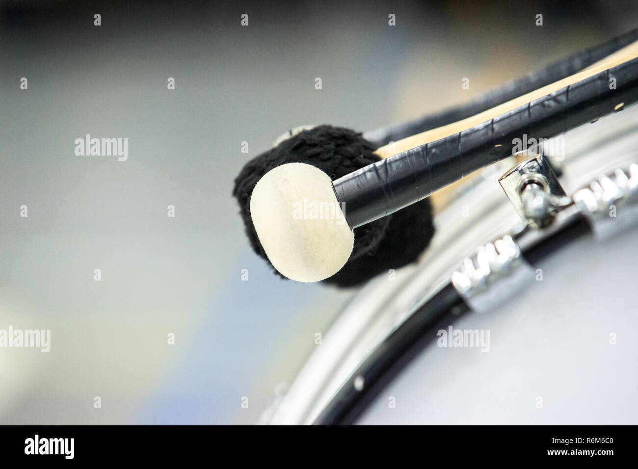 Several drumsticks mounted on a bass drum for different percussion ...