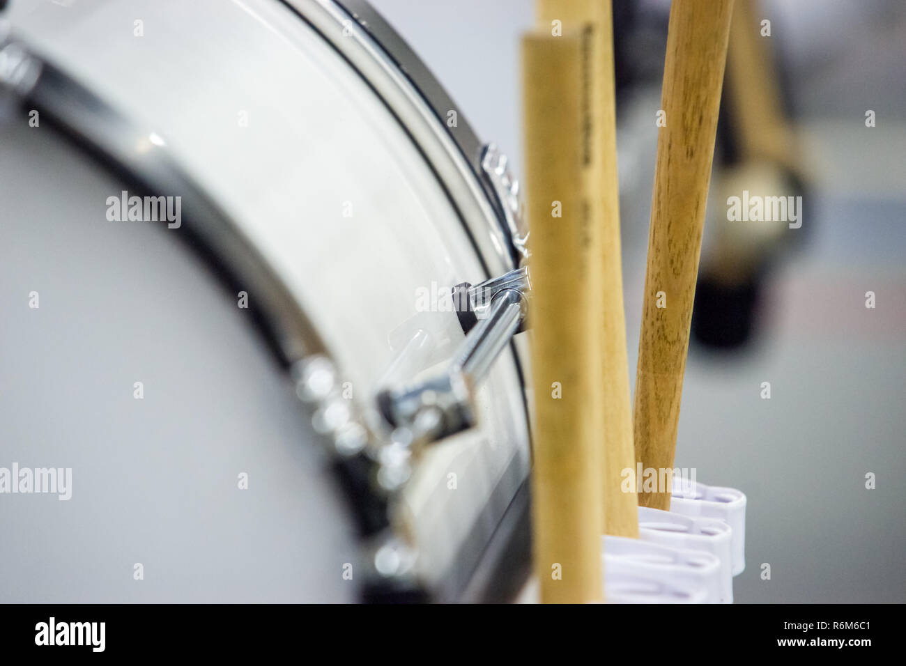 Several drumsticks mounted on a bass drum for different percussion ...
