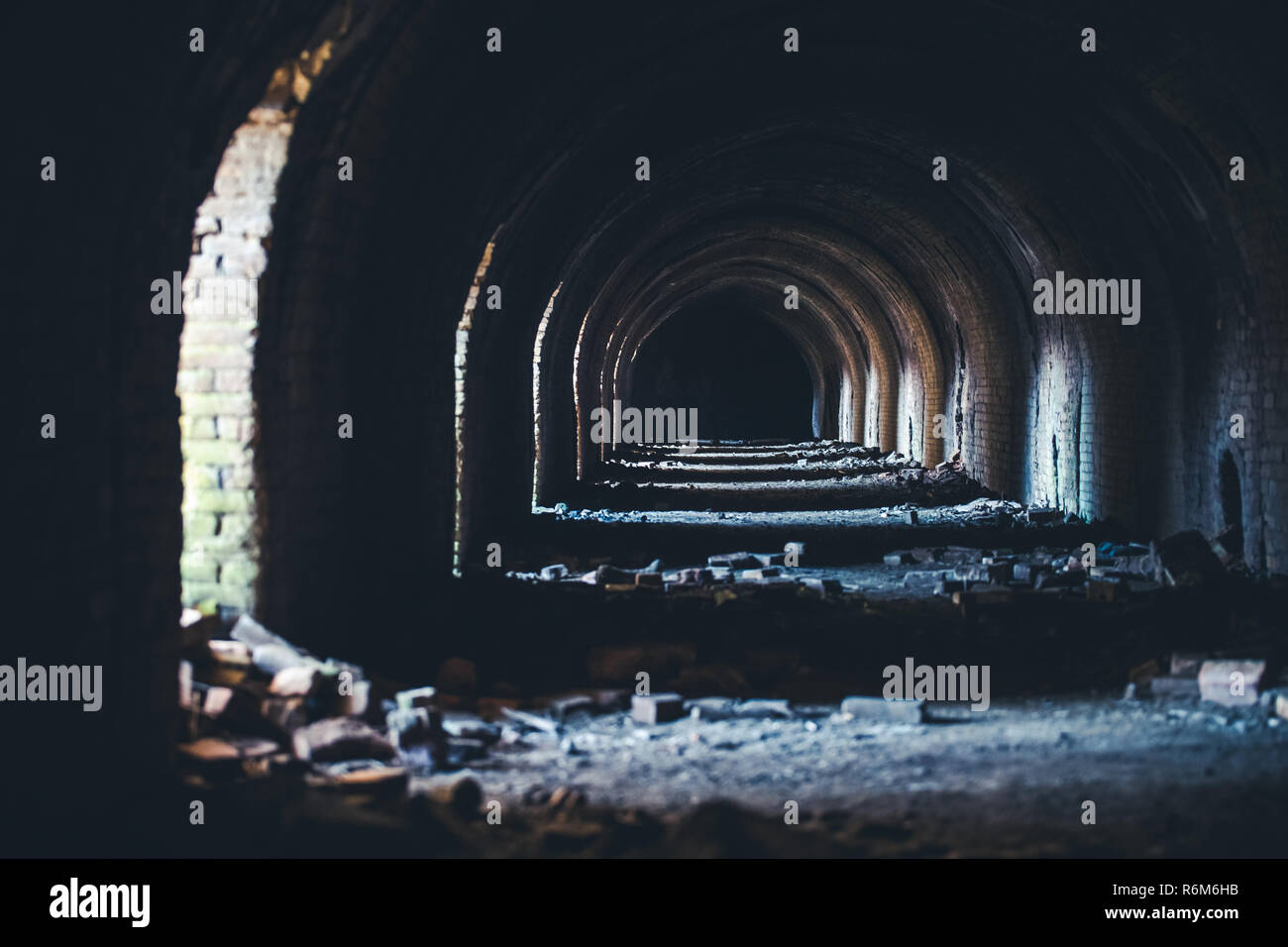 Interior of the destroyed buildings of old factory. ruins of an ...