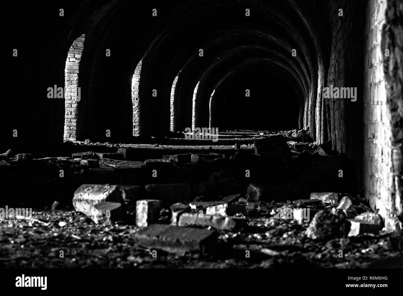 Interior of the destroyed buildings of old factory. ruins of an ...