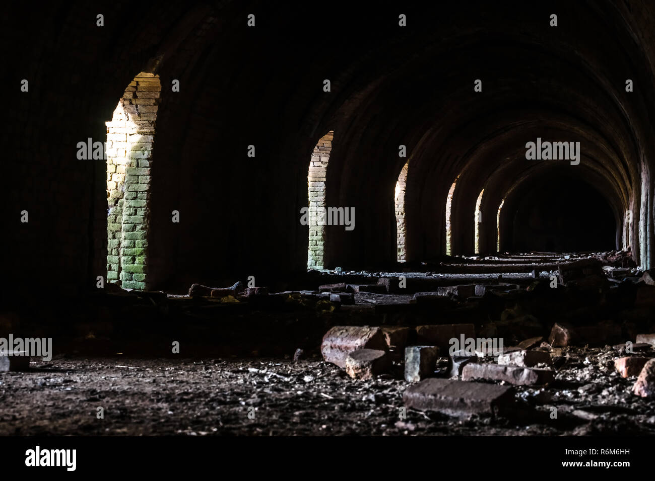 Interior of the destroyed buildings of old factory. ruins of an ...