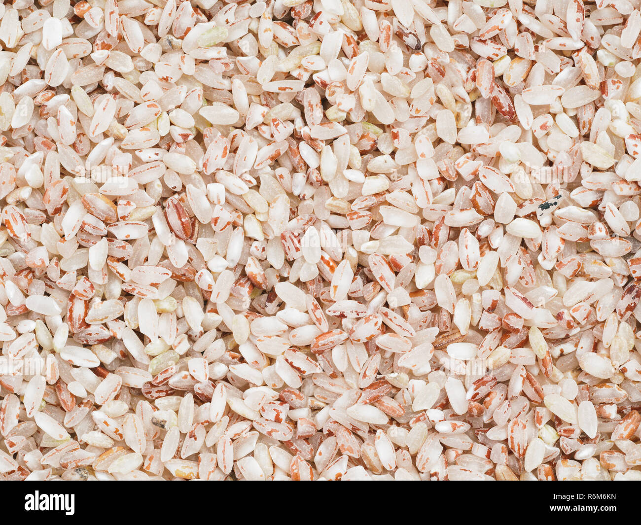 Red rice background Stock Photo - Alamy