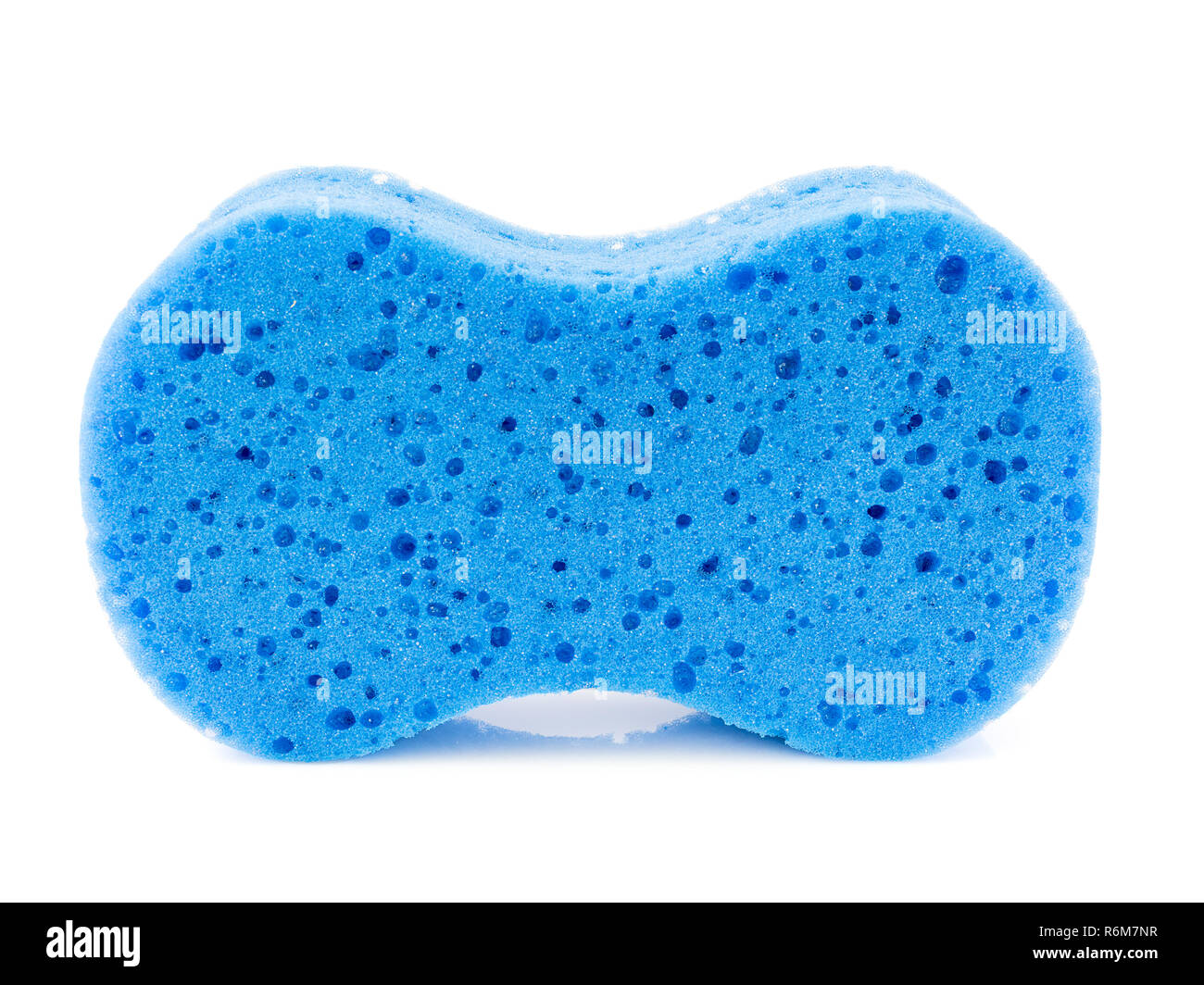 Blue sponge on white Stock Photo - Alamy