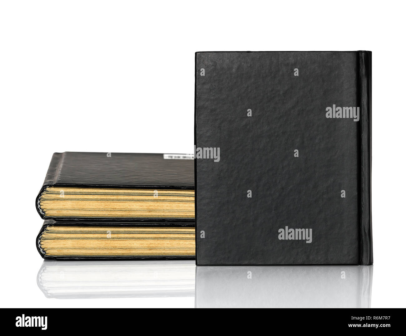 Closed black book is laying on white background Stock Photo - Alamy