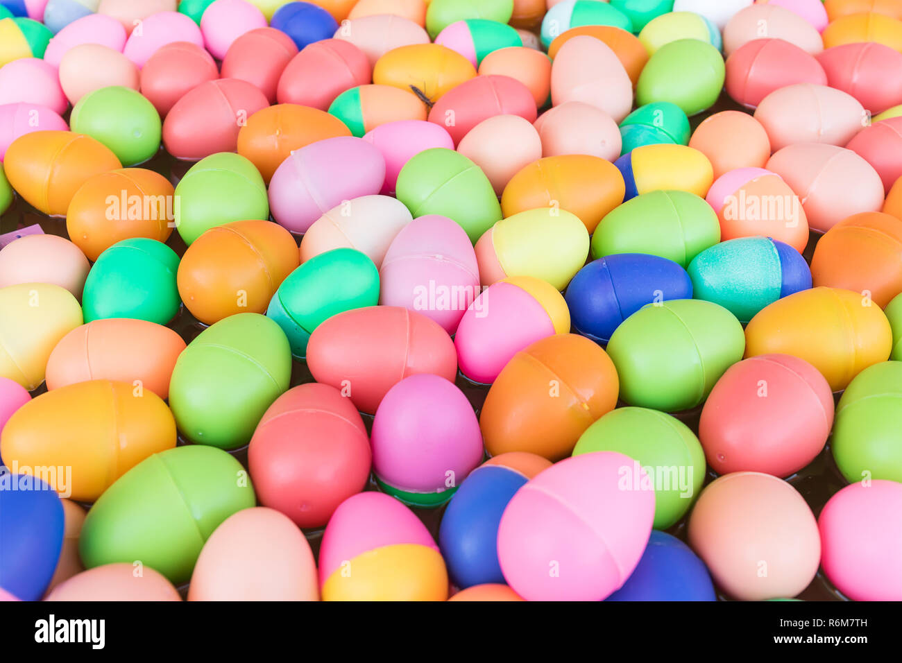 Colorful plastic eggs toy Stock Photo - Alamy