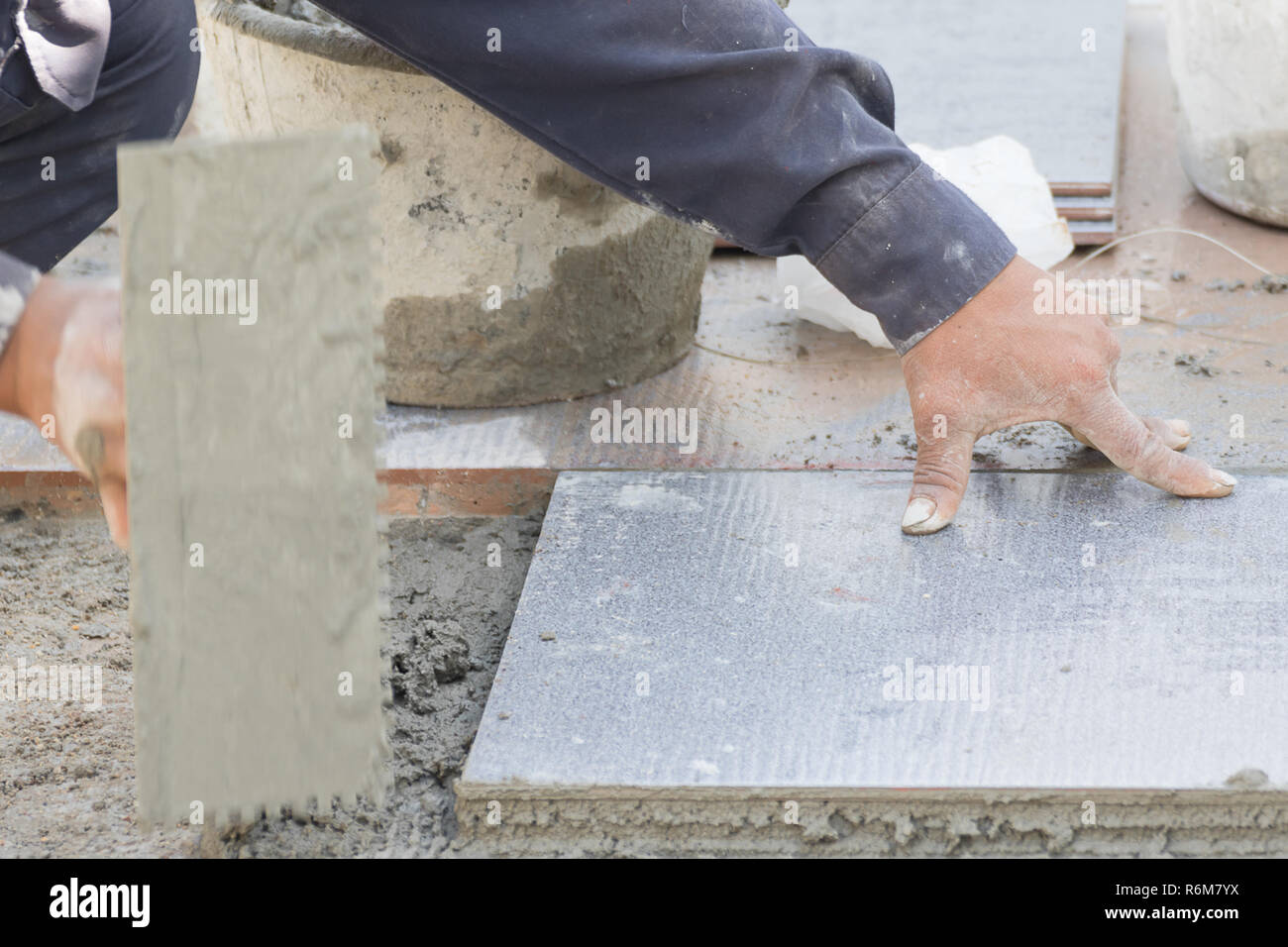 Mason tiling on floor Stock Photo - Alamy