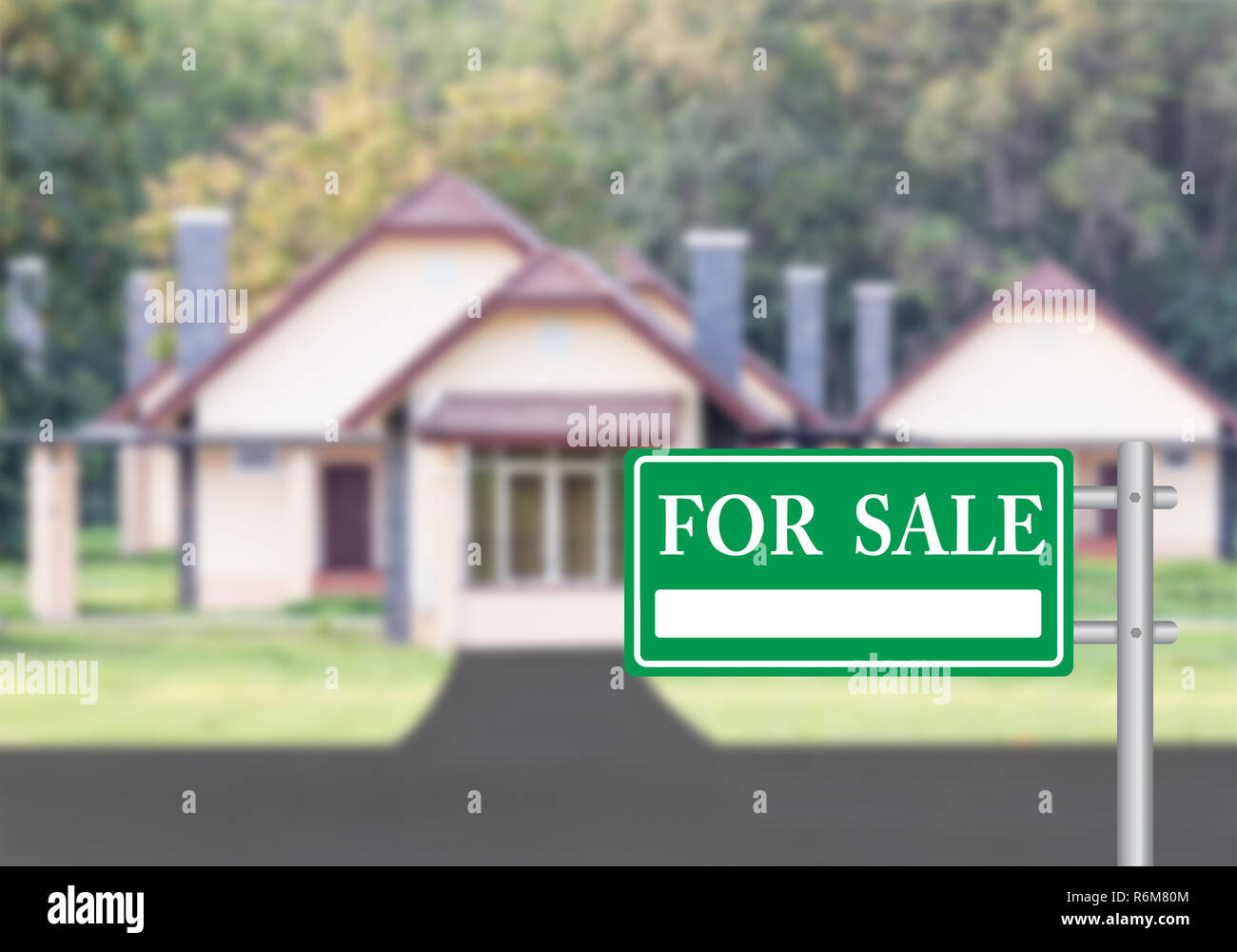 Home For Sale with green for sale sign Stock Photo - Alamy
