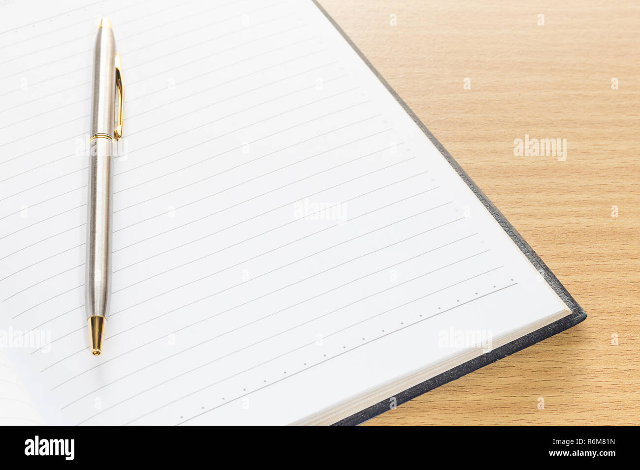 Pen and open note book with blank page Stock Photo - Alamy