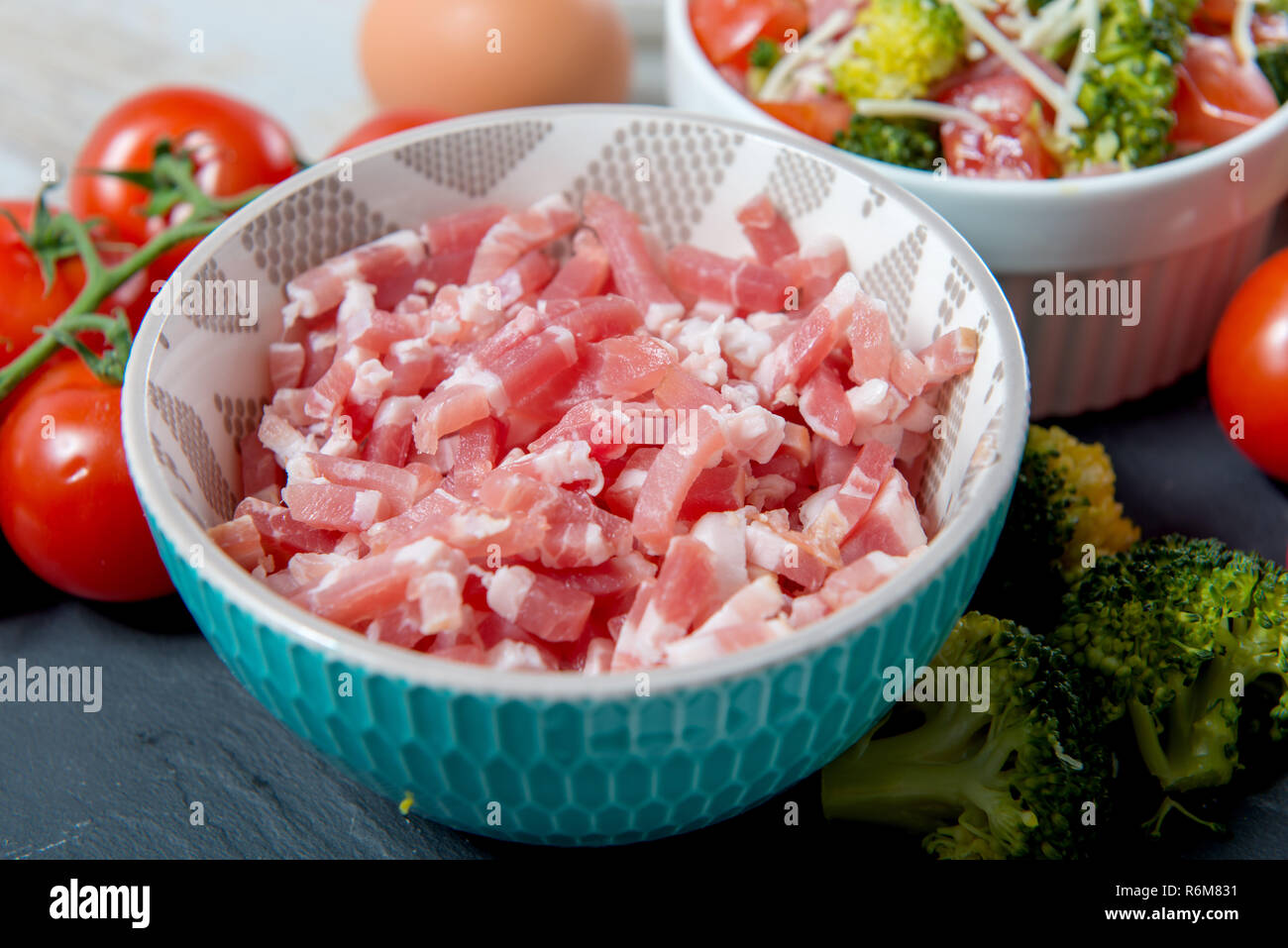 bacon cut into small pieces for cooking Stock Photo - Alamy