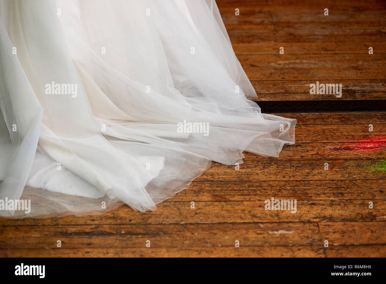 bridal dress on decking Stock Photo - Alamy