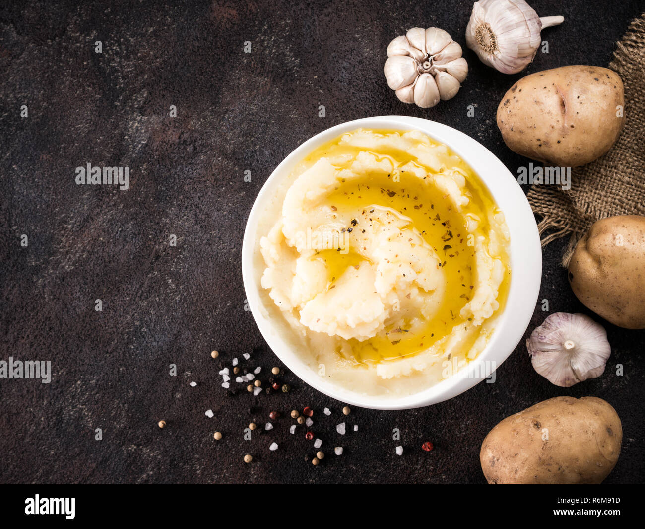 Mashed potatoes on dark concrete background Stock Photo - Alamy