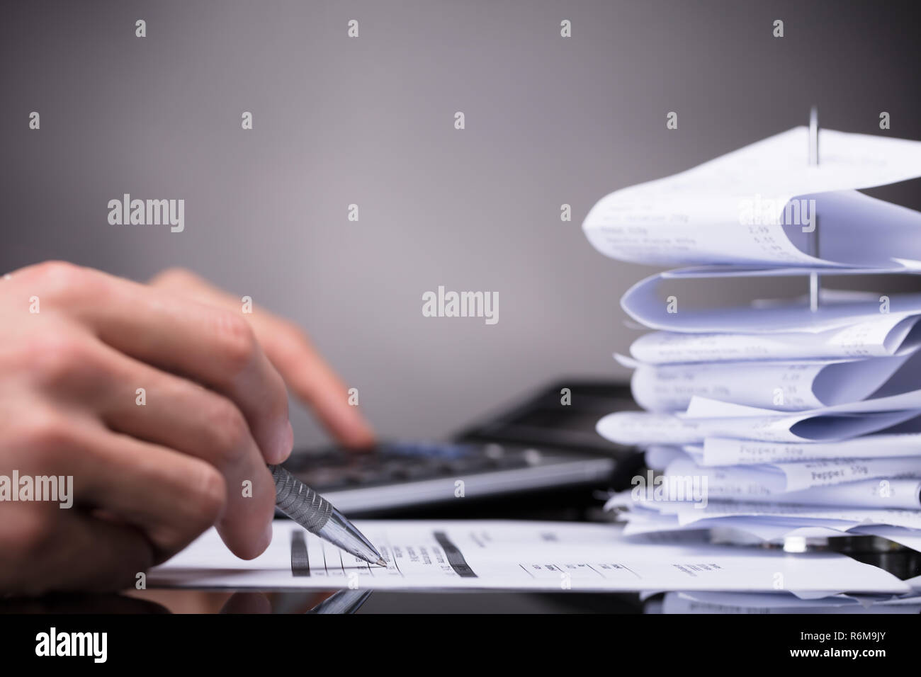 Businessperson Checking Bill Stock Photo - Alamy