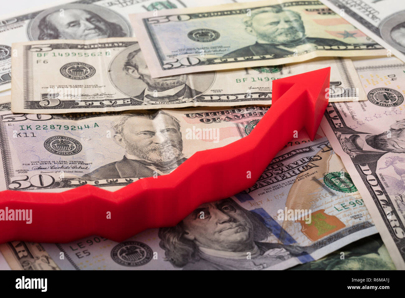 Arrow Sign On American Banknotes Stock Photo - Alamy