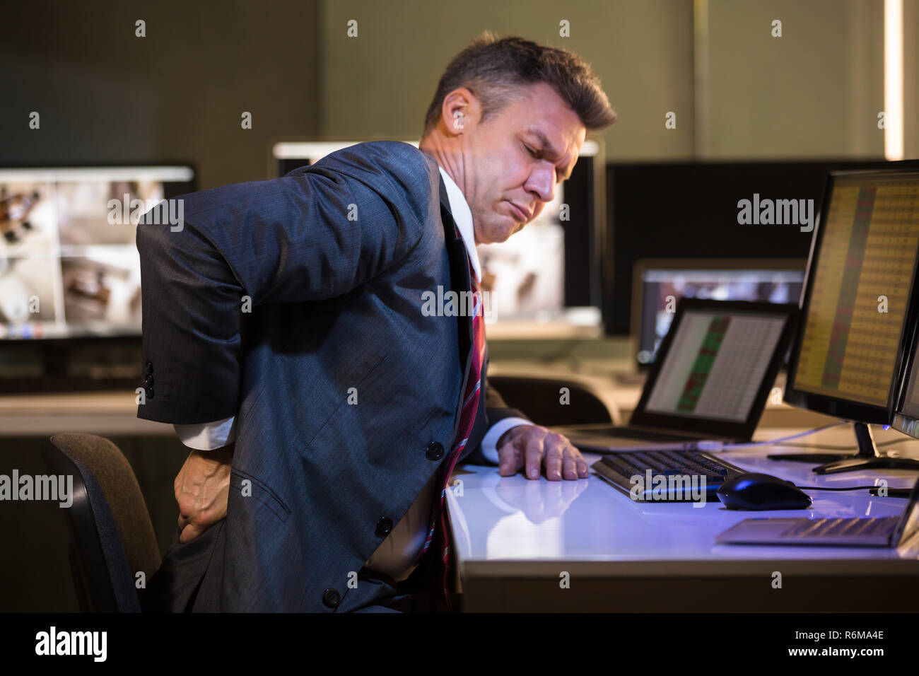 Lazy suit man chair hi-res stock photography and images - Alamy